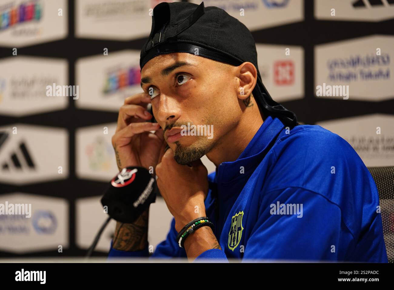 FC Barcelona's Brazilian player Rafinha speaks during the press ...