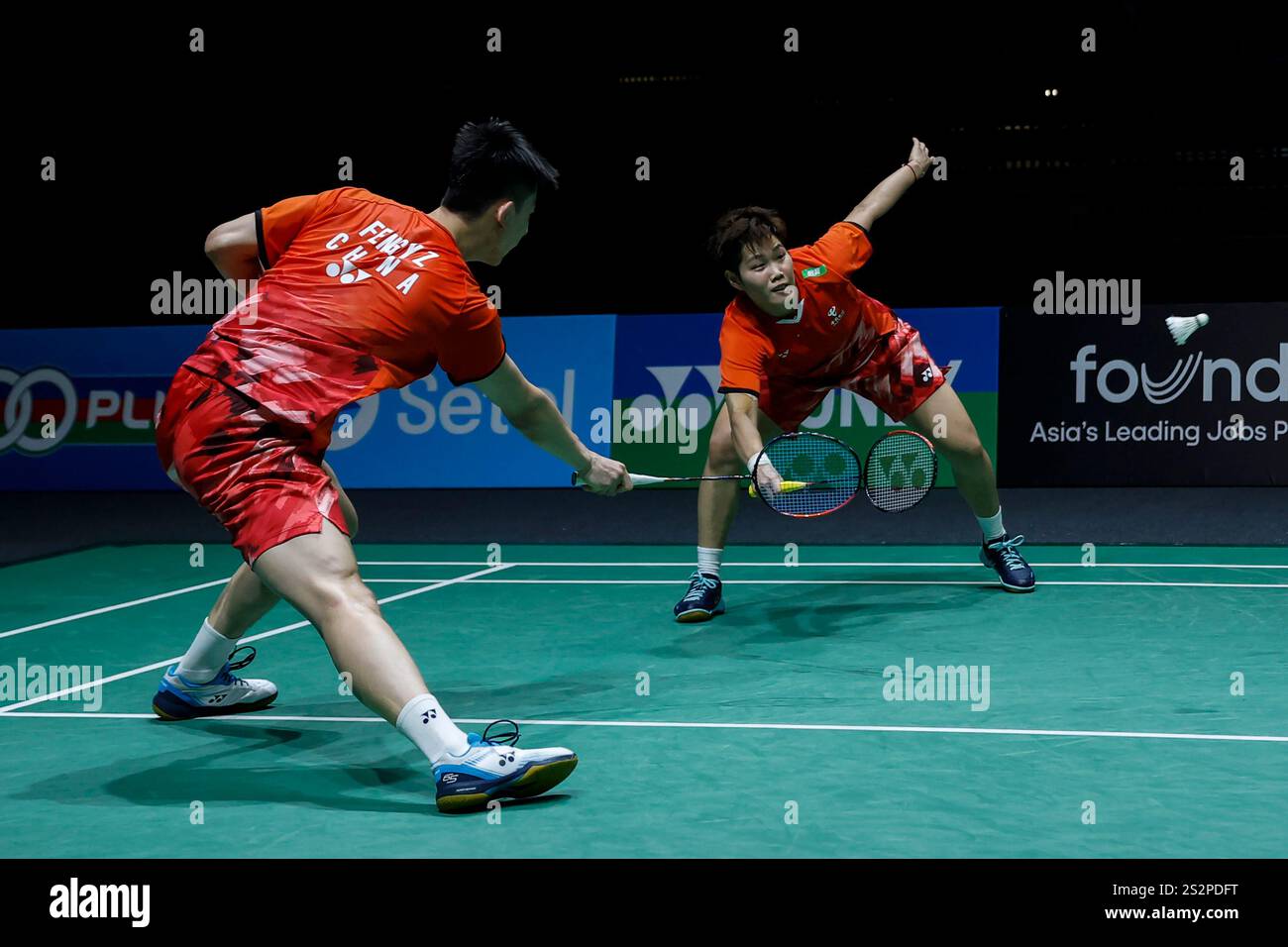 Feng Yan Zhe and Huang Dong Ping (R) of China plays against Gregory ...