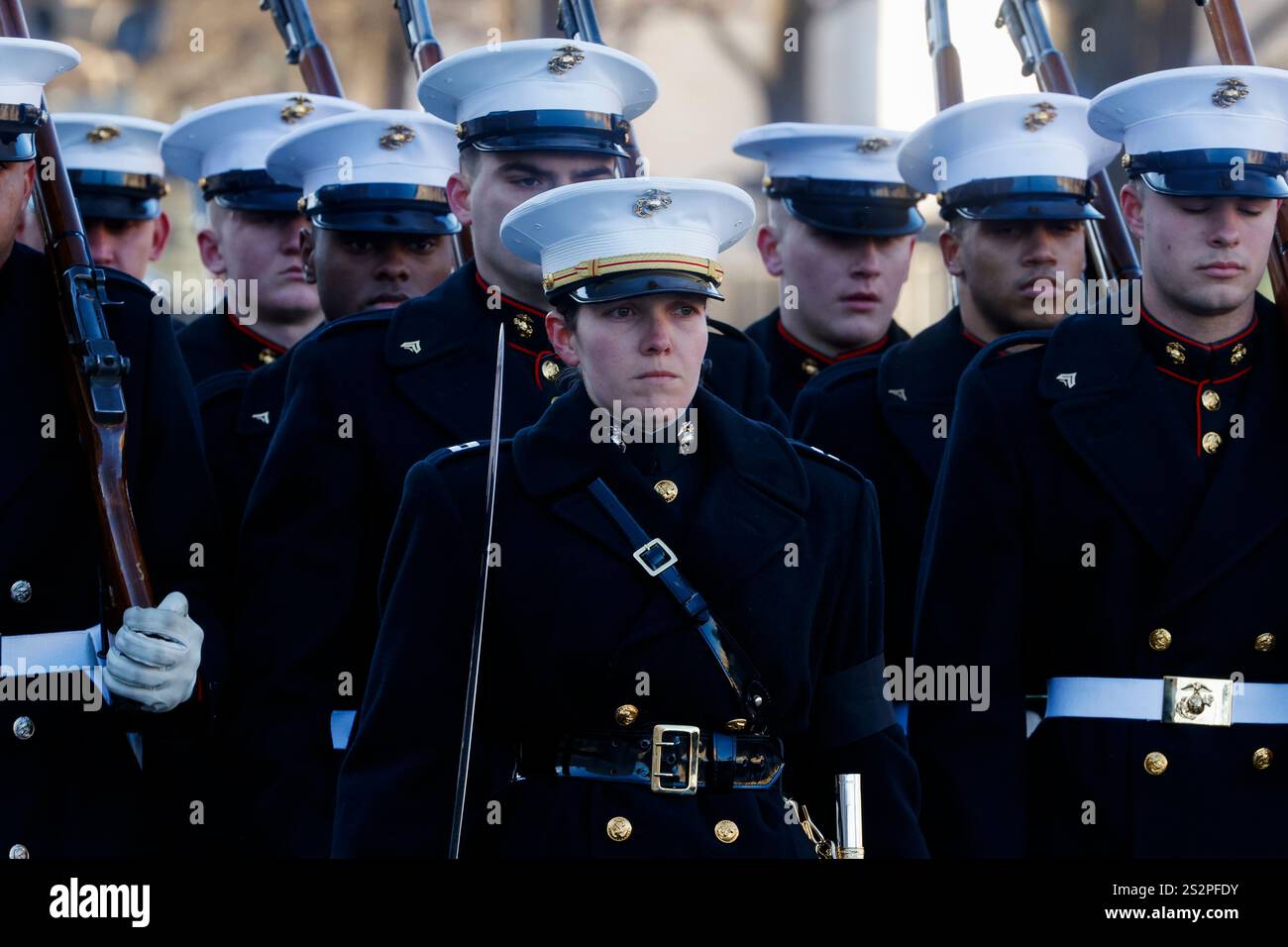 U.S. Marines stand in formation as The U.S. Army's Caisson Detachment ...