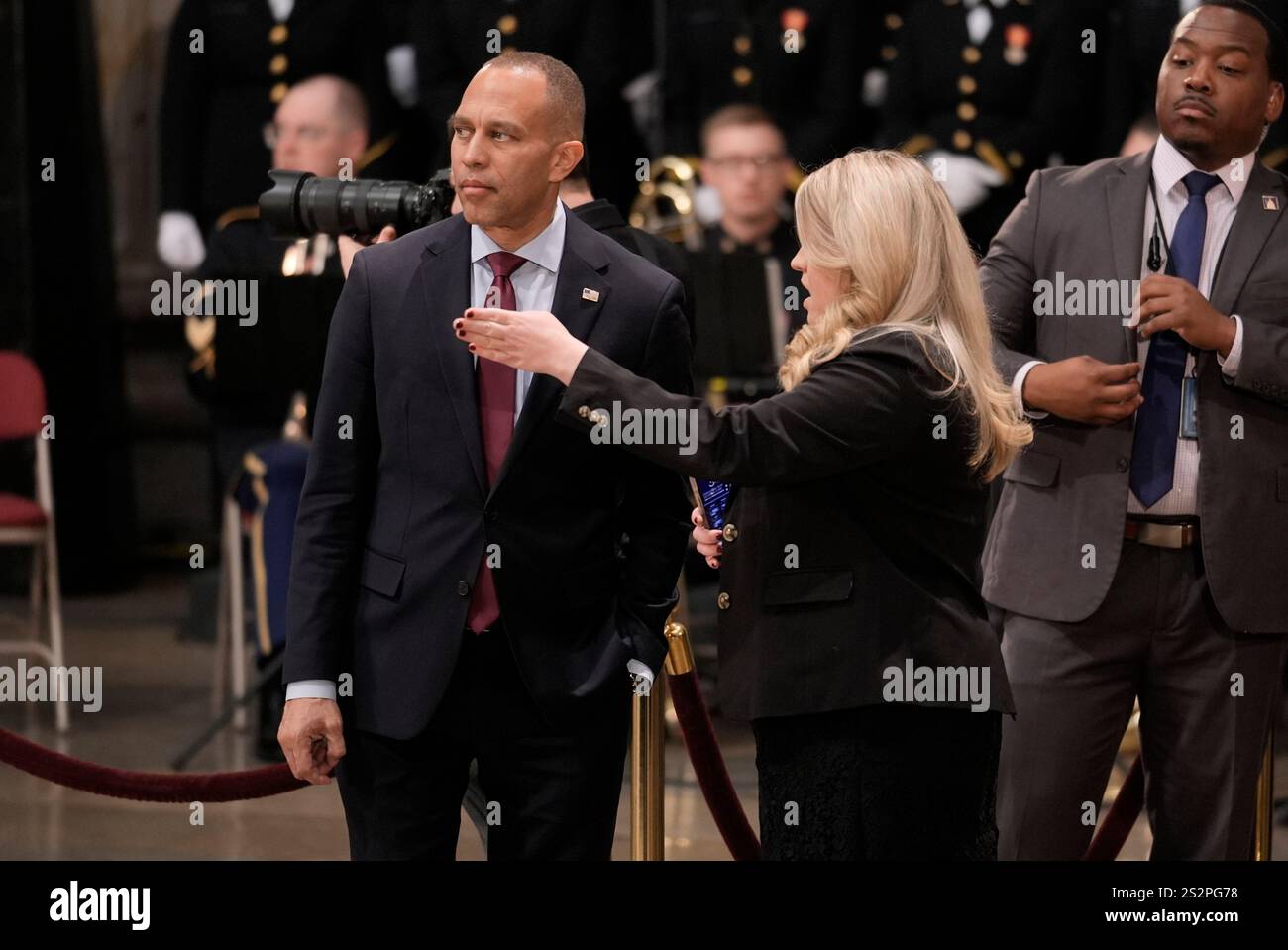 House Minority Leader Hakeem Jeffries, D-N.Y., left, arrives before the ...