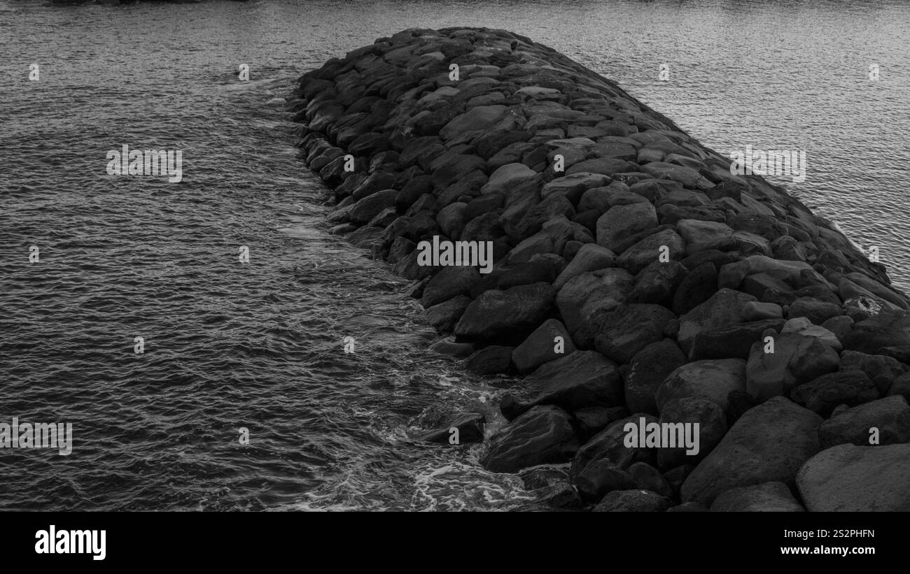 Solid rock shoreline Black and White Stock Photos & Images - Alamy