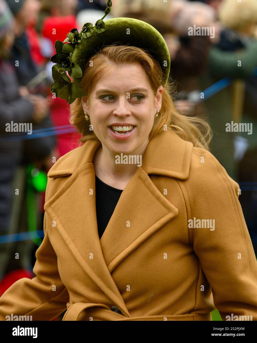 Sandringham, Norfolk UK. 25 Dec 2024. Princess Beatrice smiles at to ...