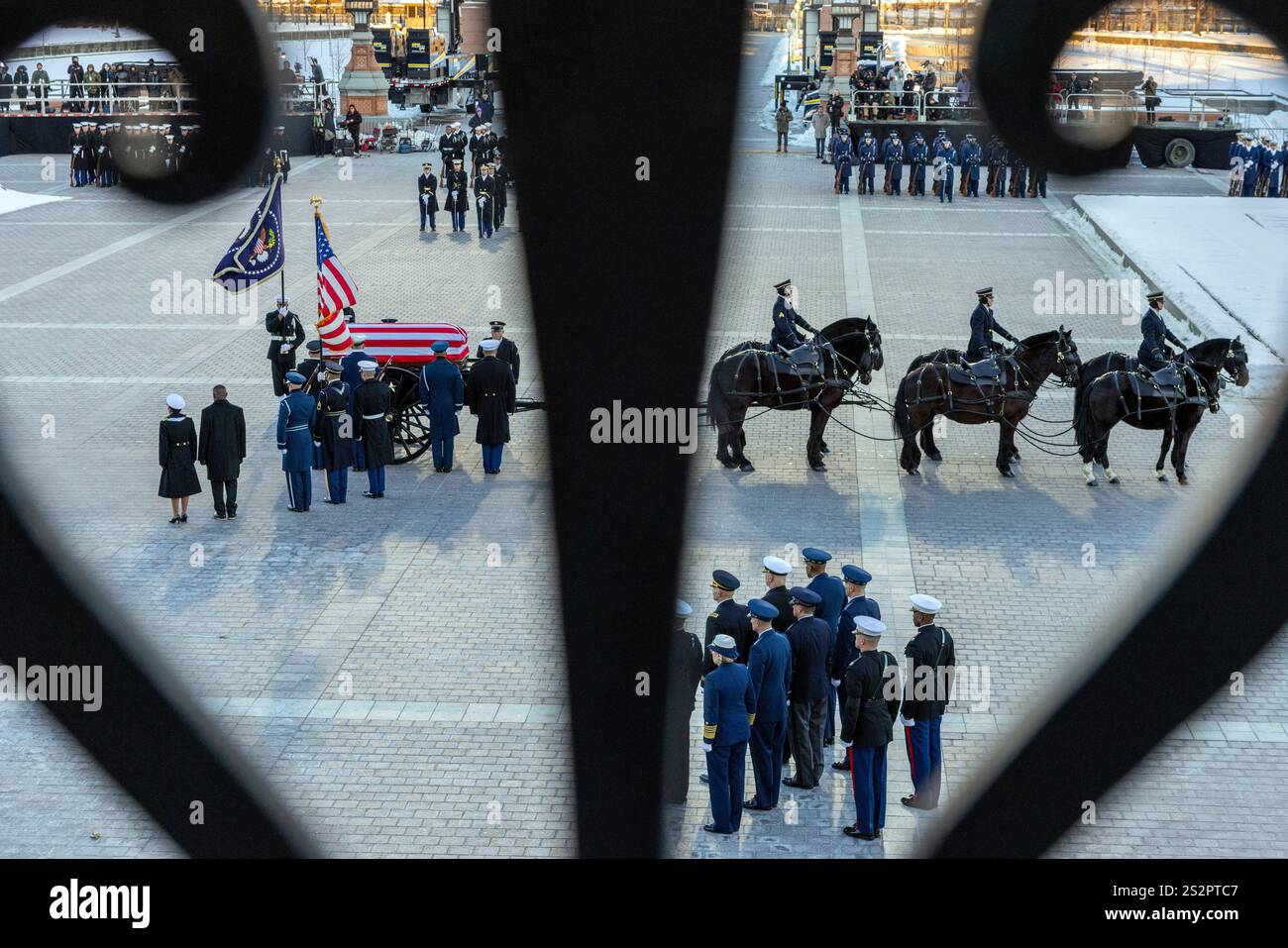 A joint services body bearer team moves the casket of former President ...