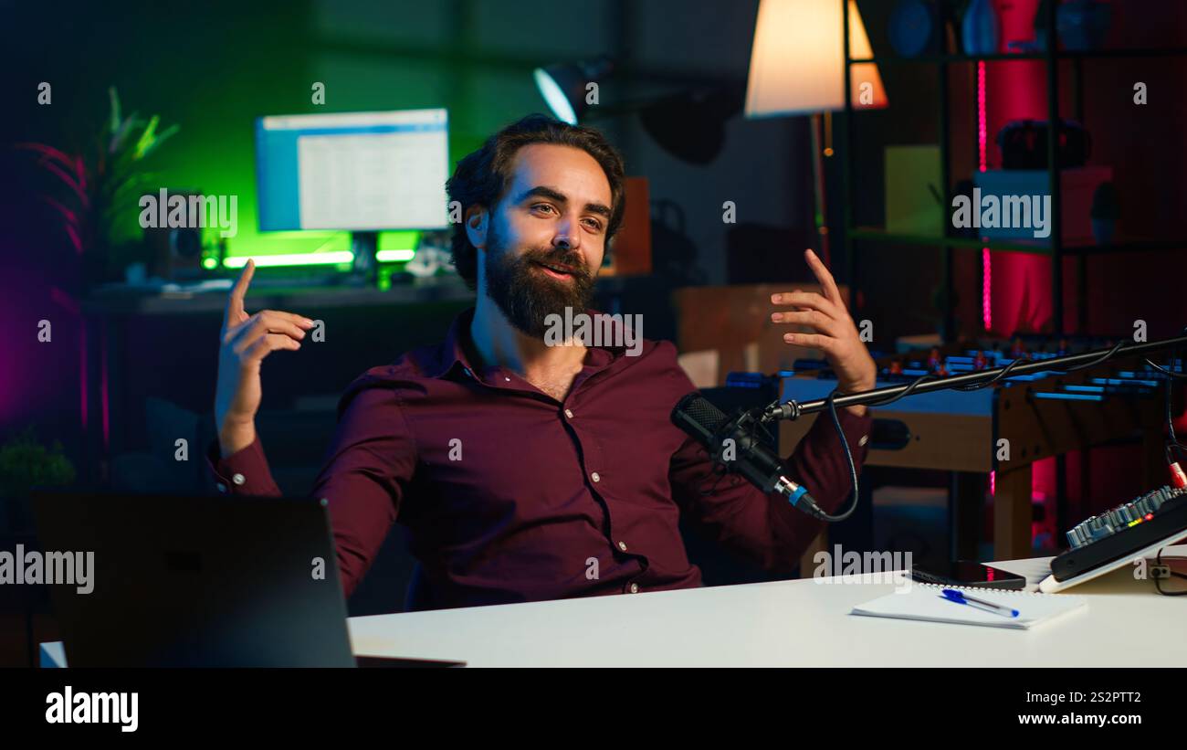 Playful internet star playing guitar in studio while shooting video ...