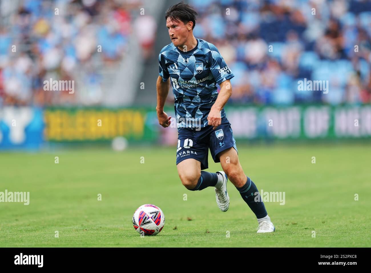 Sydney, Australia. 14th Dec, 2024. Joseph Lolley of Sydney FC controls ...