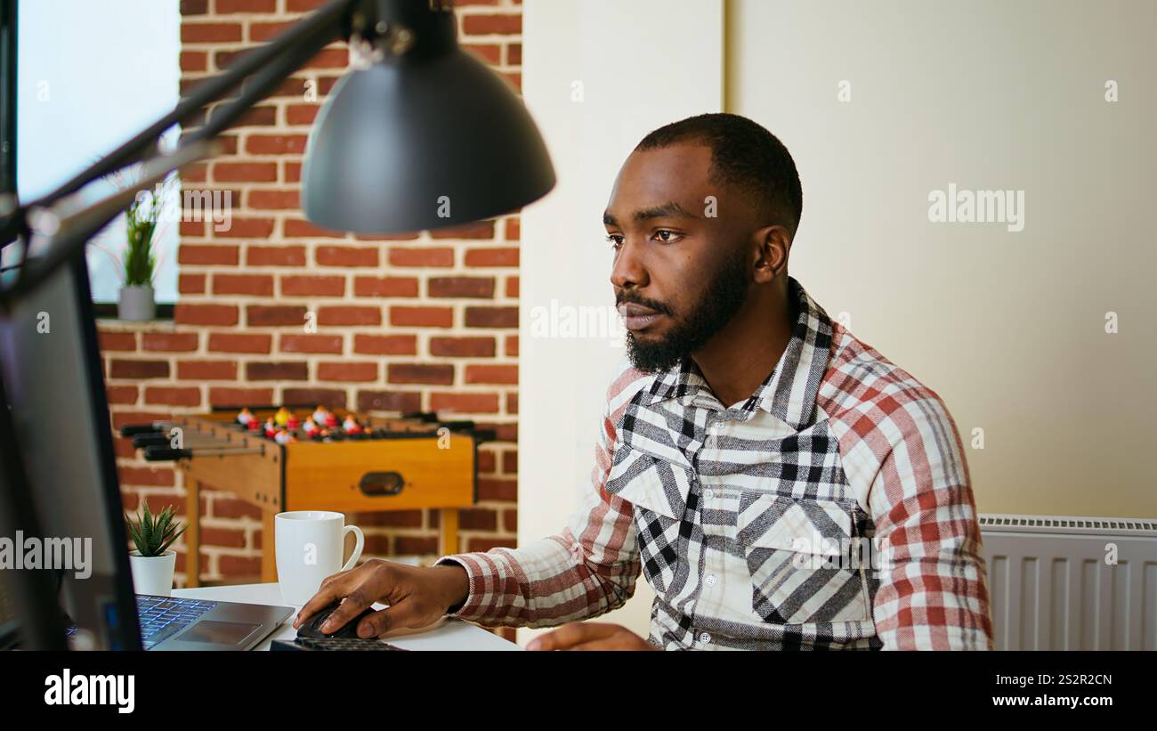 African american coder works on hi-res stock photography and images - Alamy