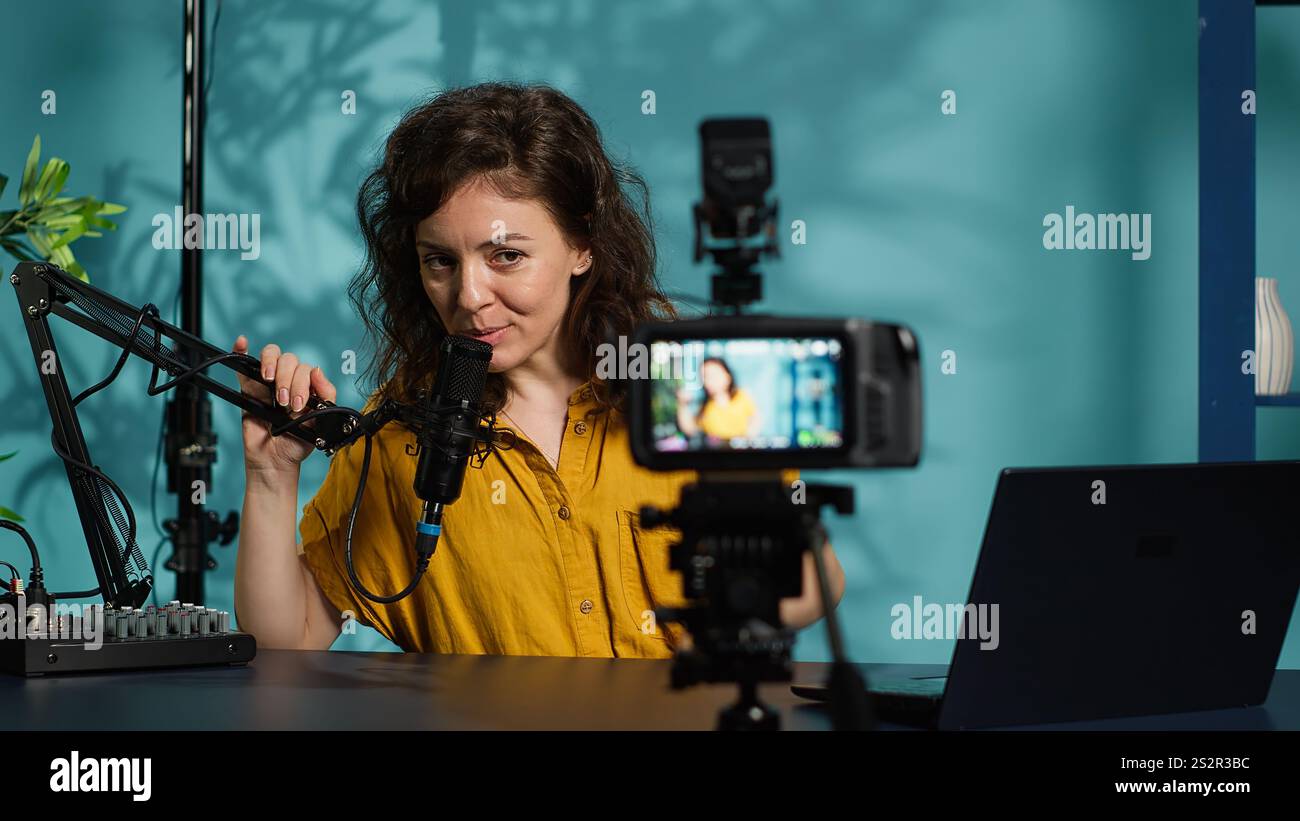 Content creator doing relaxing ASMR type of video for fans, filming in ...