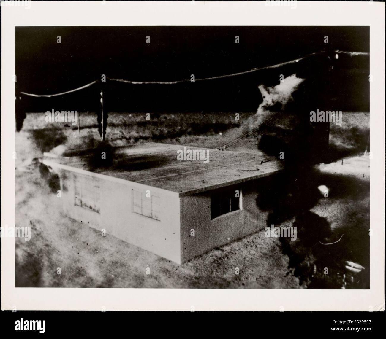 Food cases burning, Welfare photos of Operation Cue Atomic Explosion ...