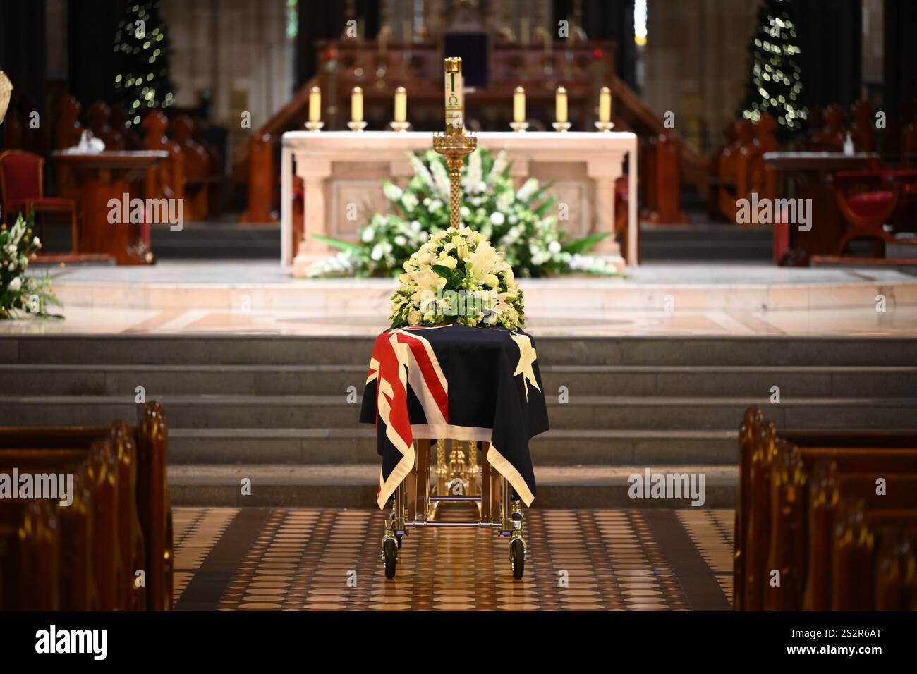 Melbourne, Australia. 23rd Dec, 2024. The casket of former Howard and ...