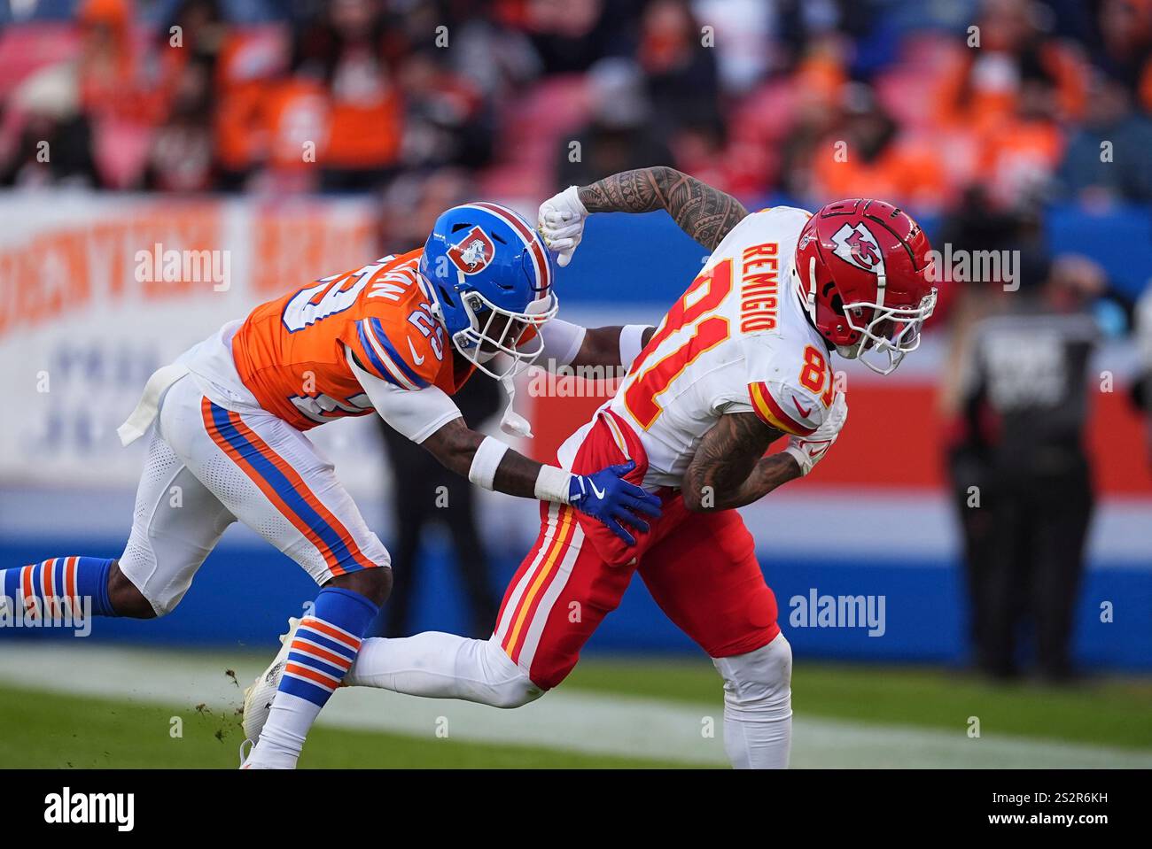 Denver Broncos cornerback Ja'Quan McMillian (29) and Kansas City Chiefs ...