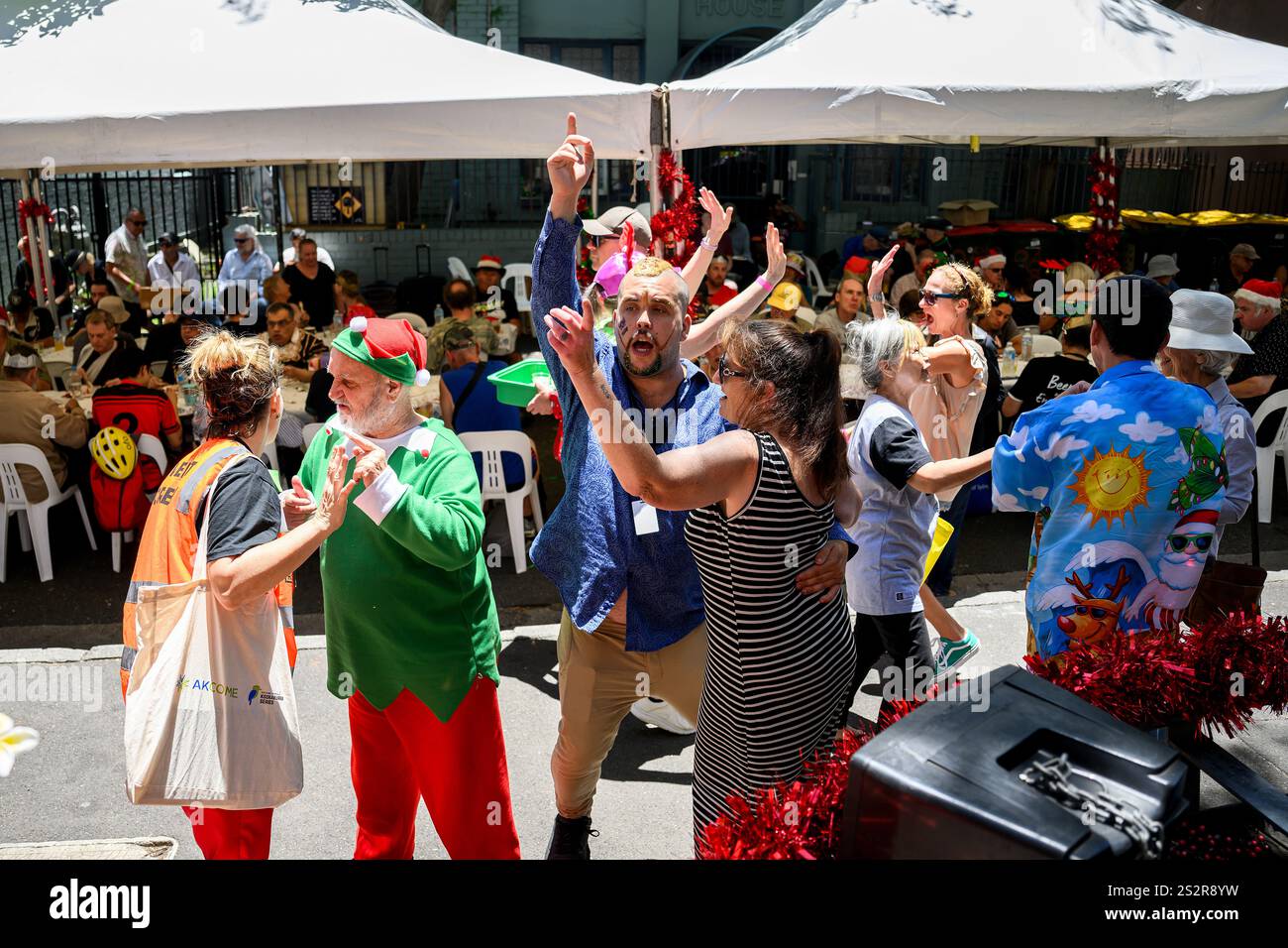 Sydney, Australia. 25th Dec, 2024. Members of the community are seen ...