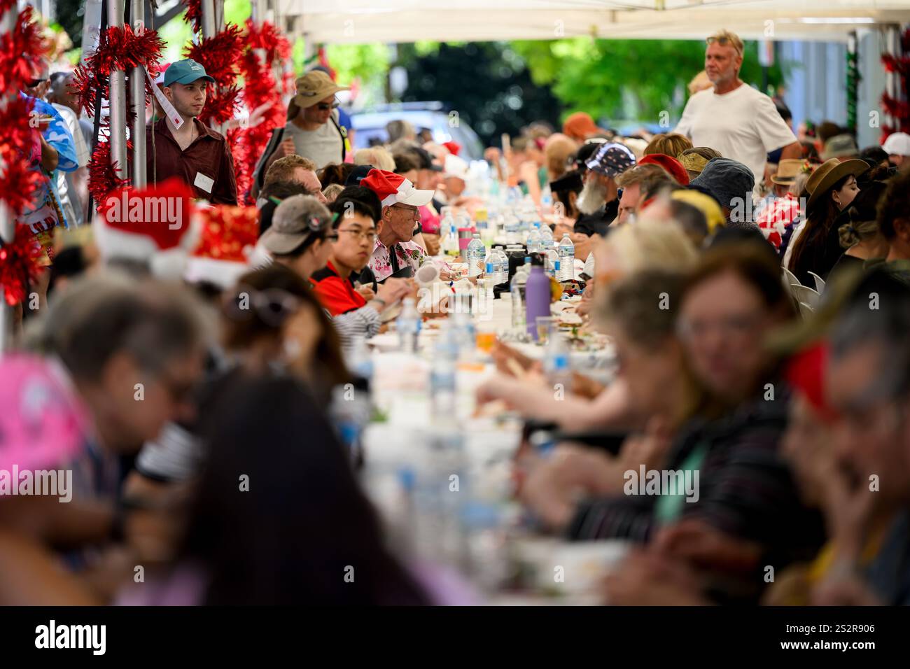Sydney, Australia. 25th Dec, 2024. Members of the community attend the ...