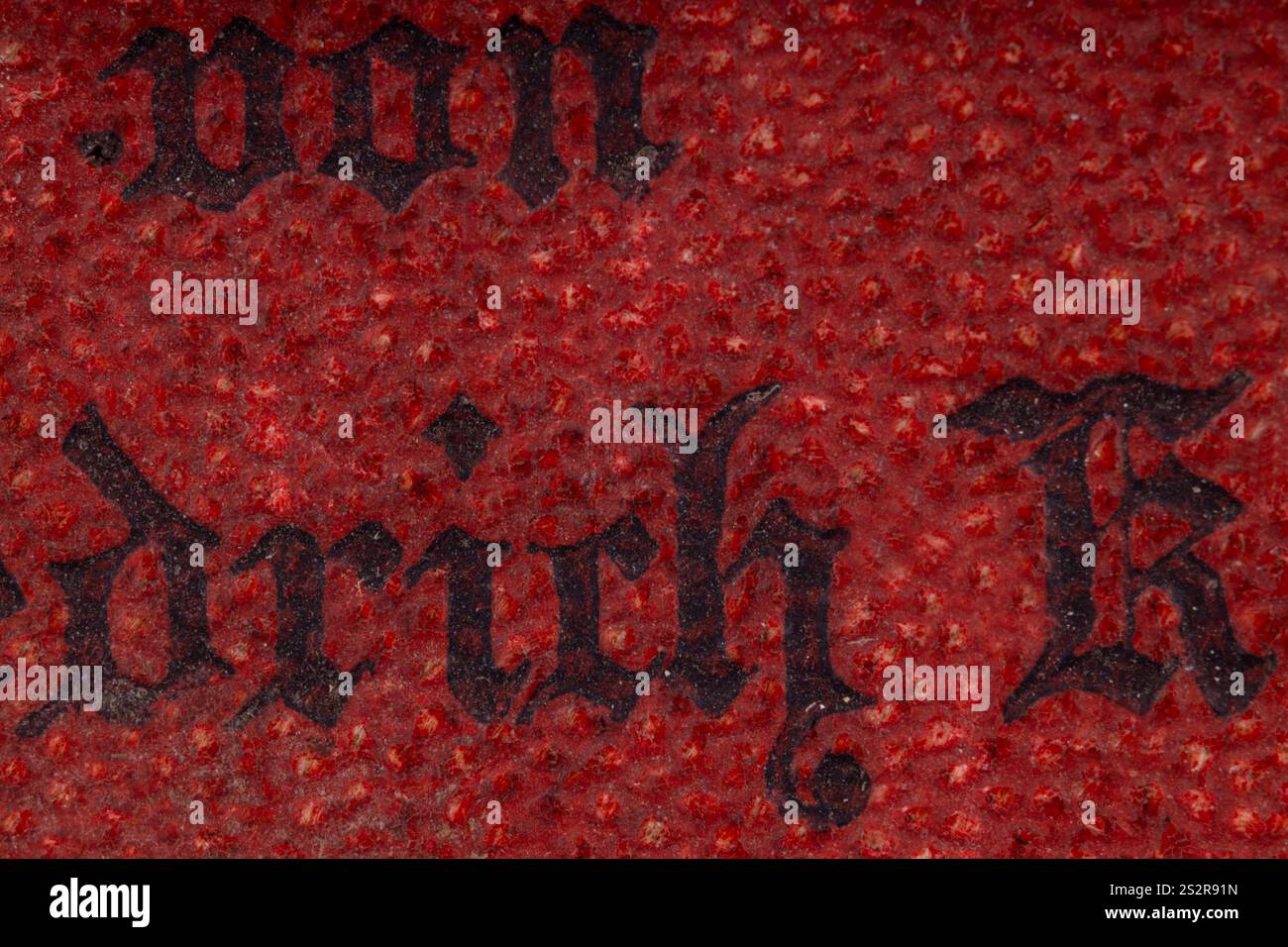 Close up of antique book cover with Gothic text Stock Photo - Alamy