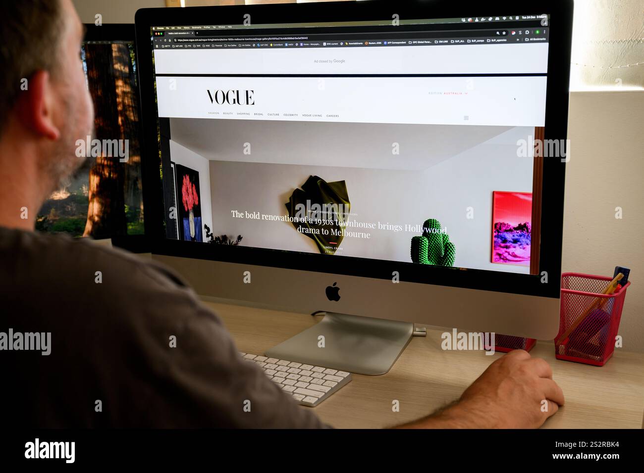 Sydney, Australia. 24th Dec, 2024. A person is seen viewing an online ...