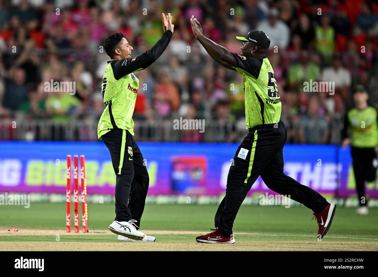 Tanveer Sangha of the Thunder (left) celebrates with Sherfane ...