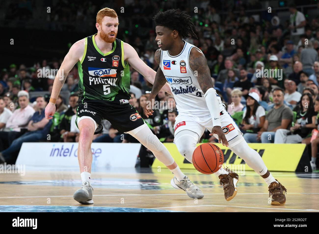 Melbourne, Australia. 21st Dec, 2024. Angus Glover of the Phoenix (left ...