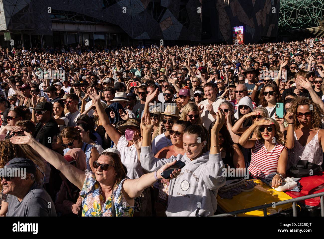 Entertainer Robbie Williams’ fans are seen as he performs during a free ...