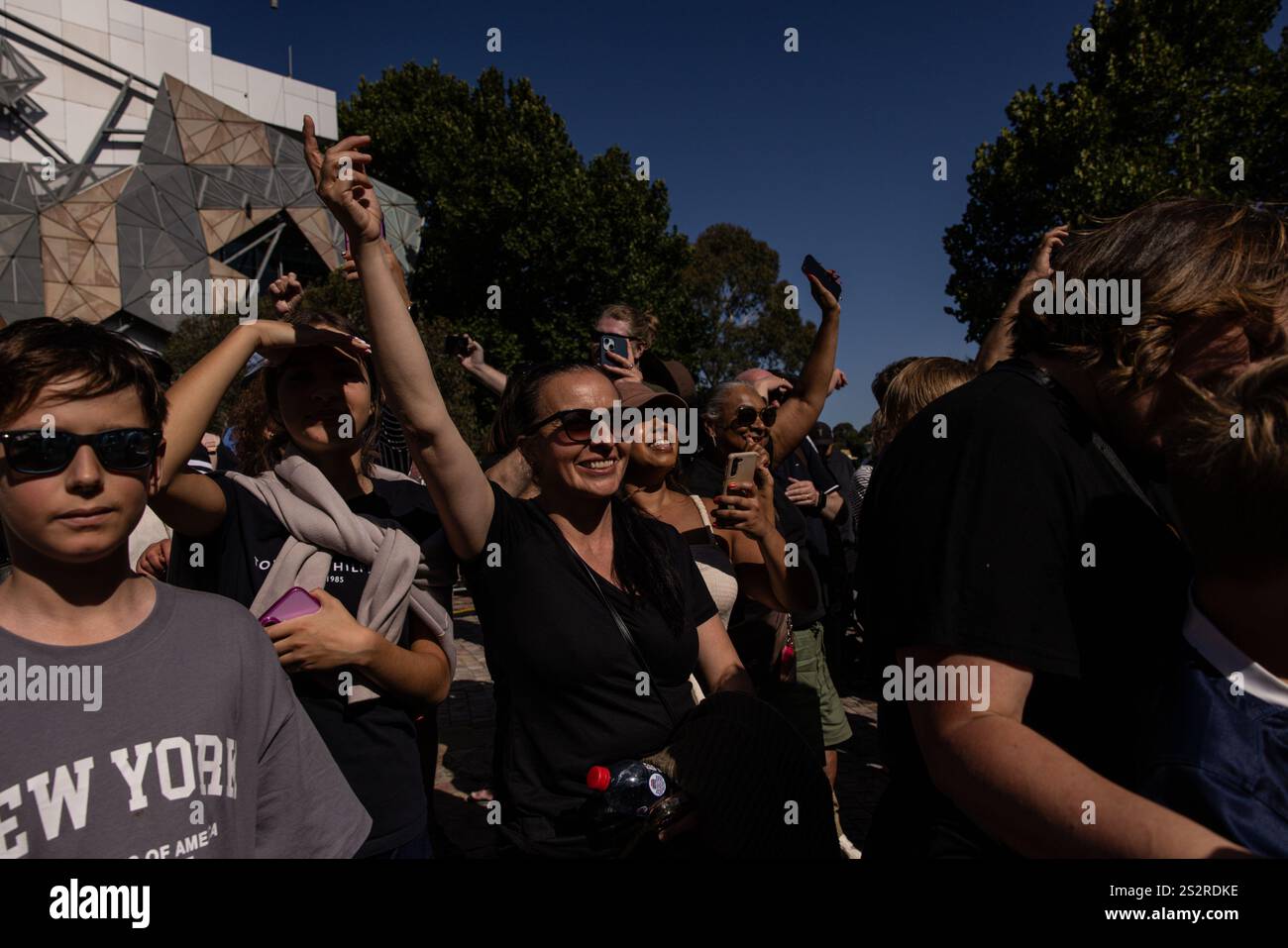 Entertainer Robbie Williams’ fans are seen as he performs during a free ...