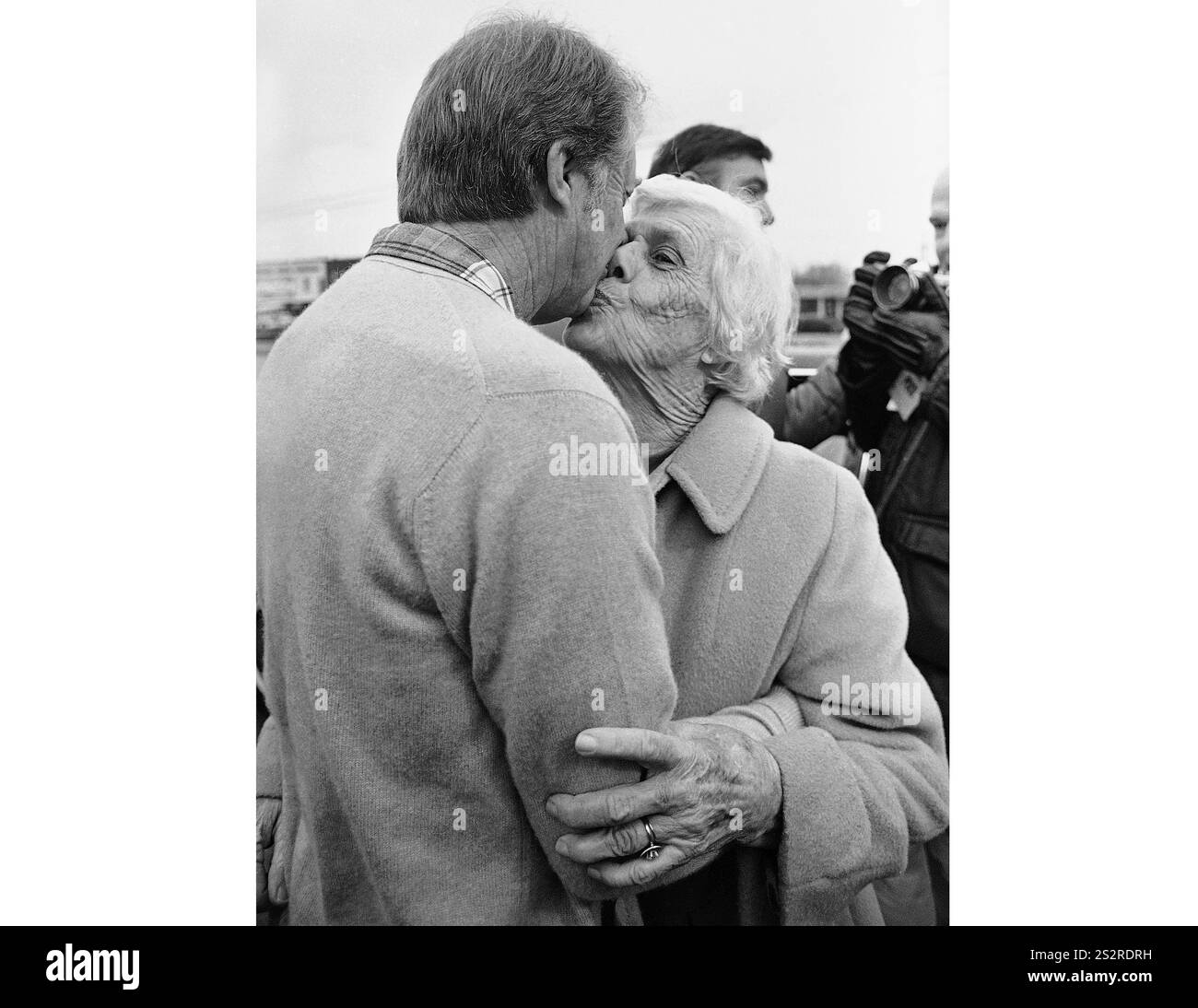 FILE - President-elect Jimmy Carter gets a kiss from his mother ...