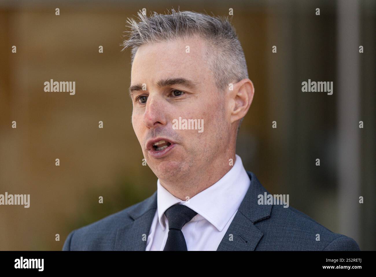 Detective Senior Constable Adam Stafford speaks to media outside ...