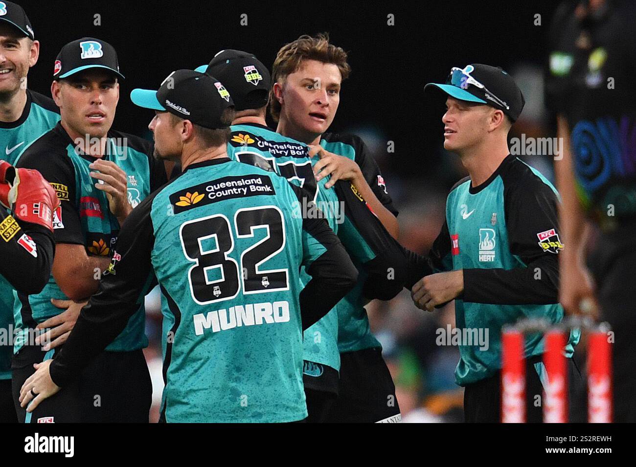 Brisbane, Australia. 22nd Dec, 2024. Tom Whitney of the Heat celebrates ...