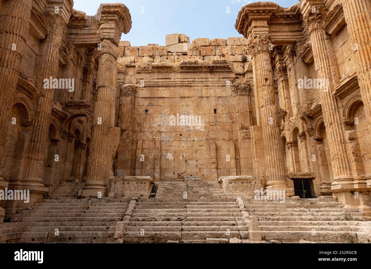 There is a prominent large stone building featuring grand stairs that ...