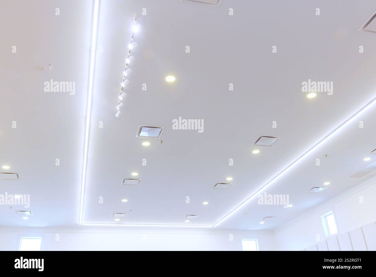 Bright lighting fixtures sleek design elements create an airy ...