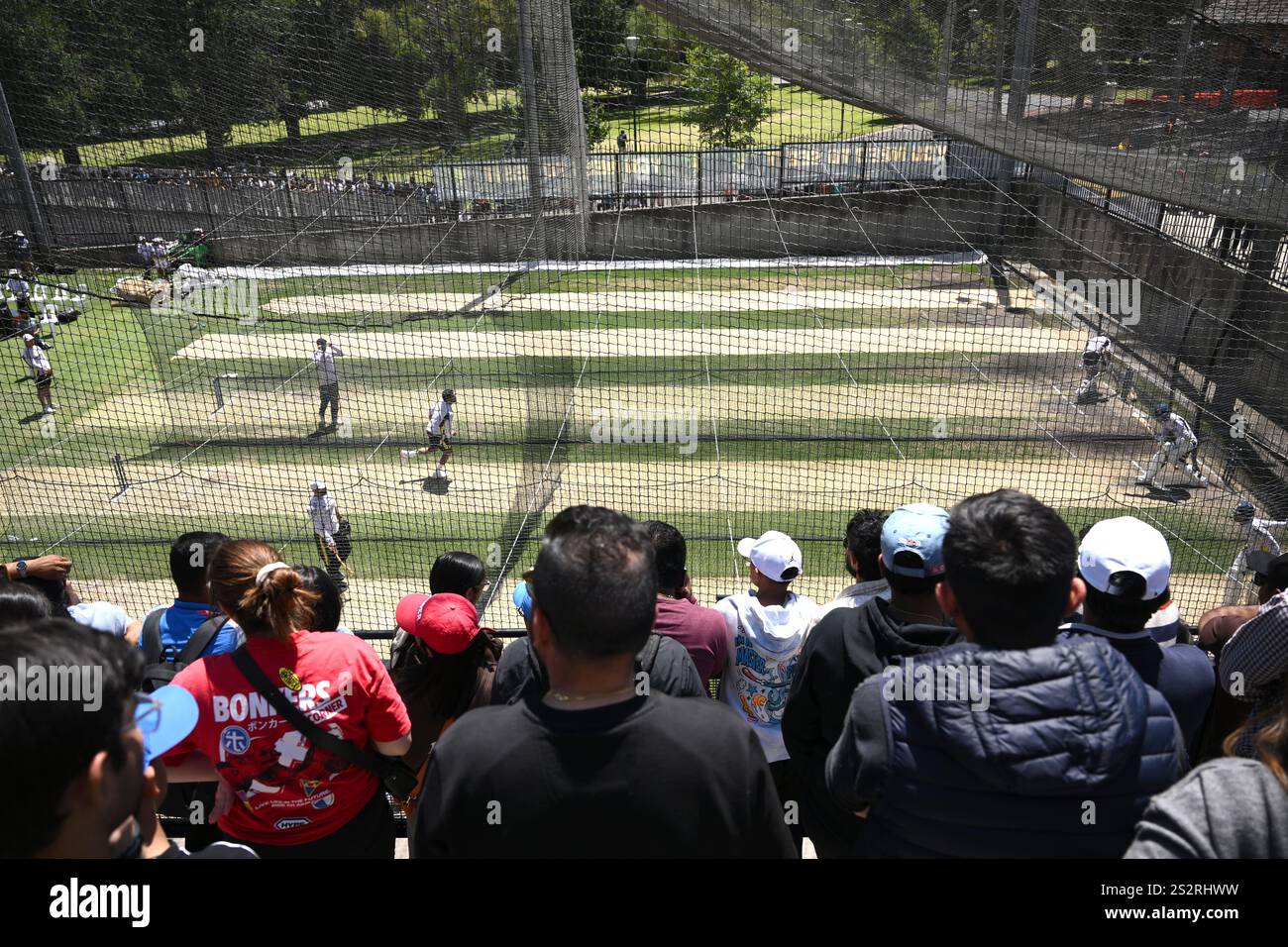 India supporters watch over a cricket team training session at the ...