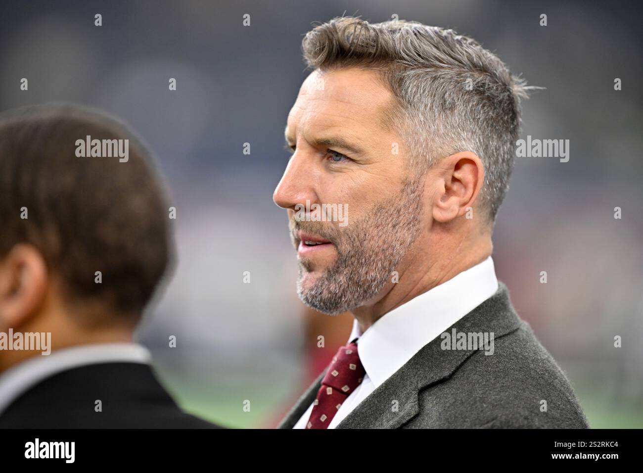 Washington Commanders general manager Adam Peters looks on from the ...