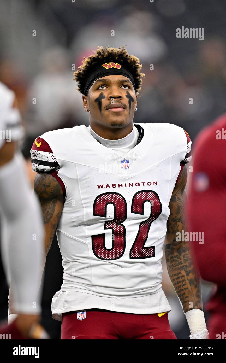 Washington Commanders linebacker Mykal Walker (32) walks off the field ...