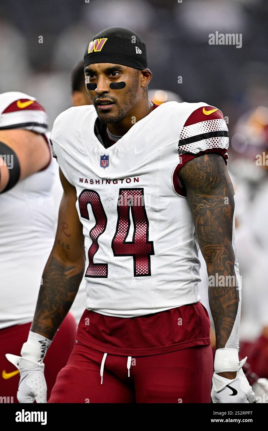 Washington Commanders cornerback Michael Davis (24) walks off the field ...