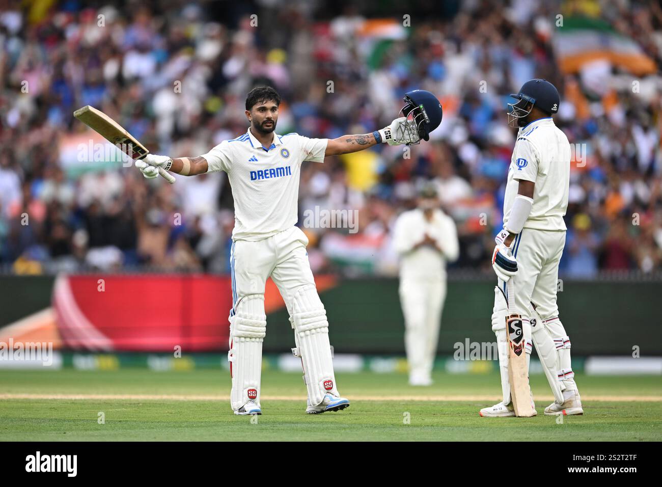 Melbourne, Australia. 28th Dec, 2024. Nitish Kumar Reddy of India (left ...
