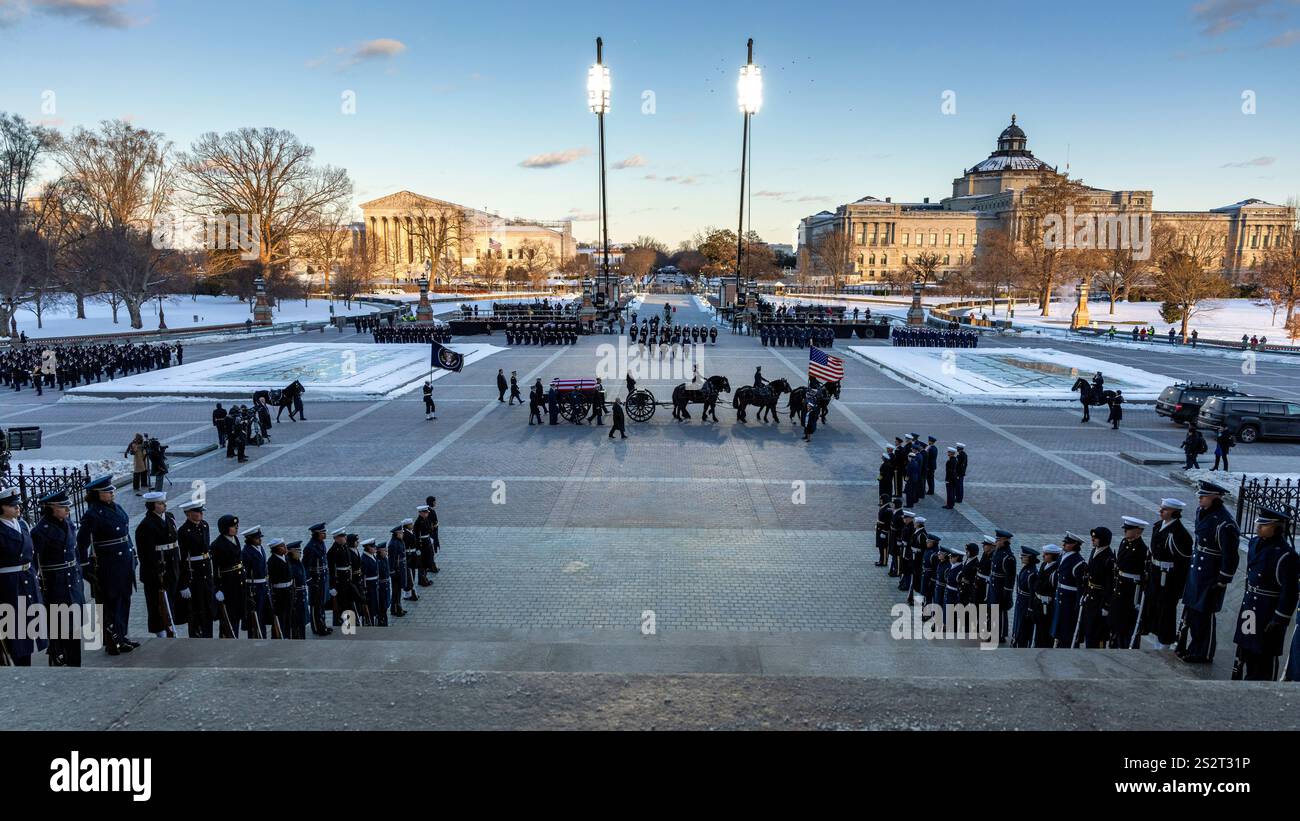 A horse-drawn caisson with the flag-draped casket of former President ...