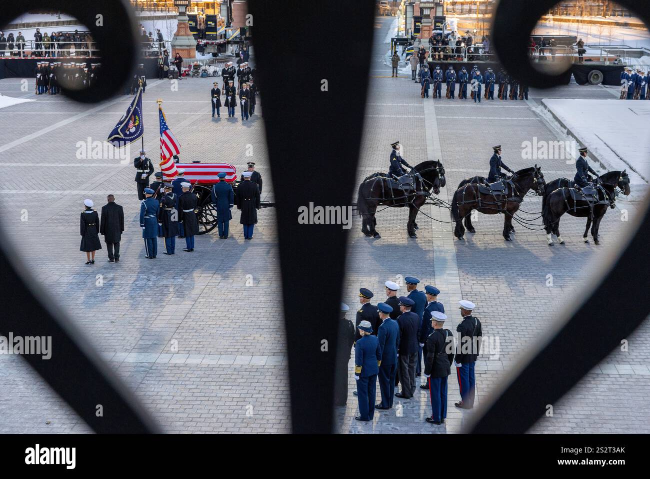 The casket of former US President Jimmy Carter arrives on a horse-drawn ...