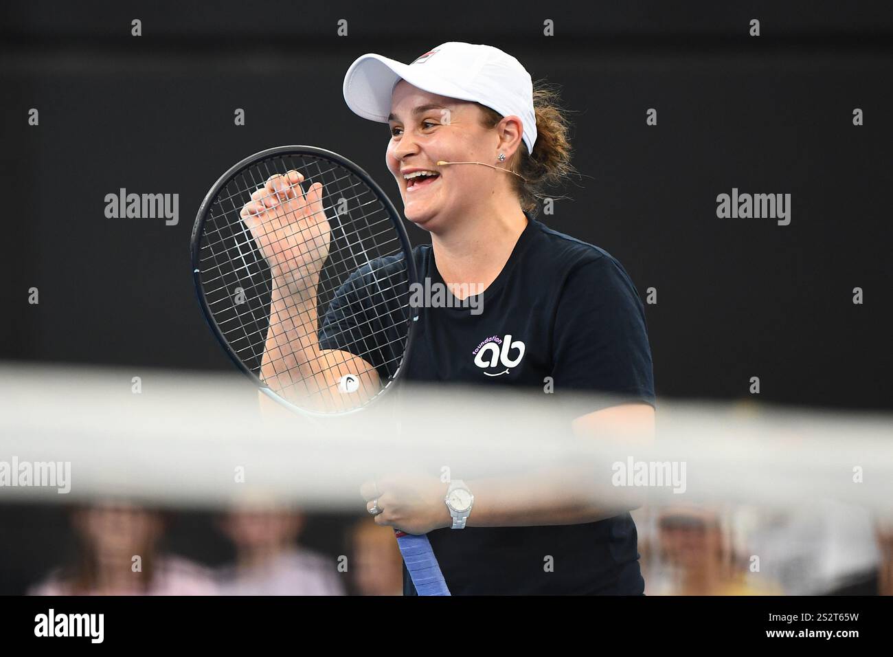 Ash Barty of Australia reacts during a mixed doubles exhibition match ...