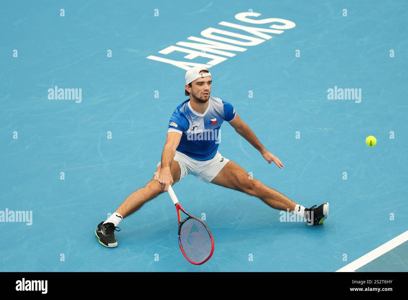 Tomas Machac of Team Czechia does a partial splits as he plays a ...