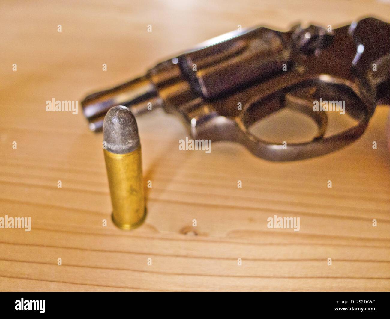 A revolver with a single cartridge. Symbolic photo for Russian roulette ...