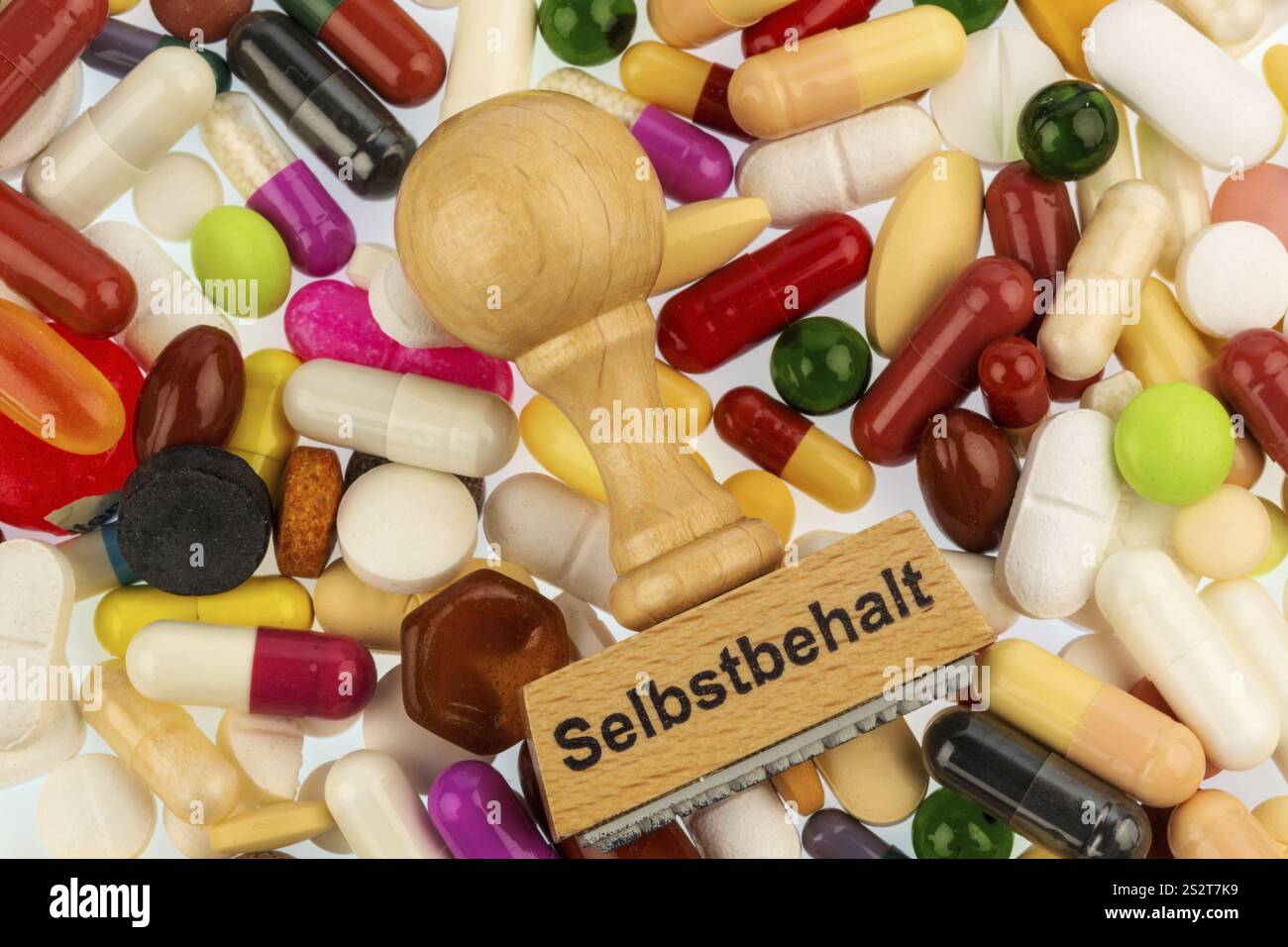 Stamp on colourful tablets, symbol photo for medication, health ...