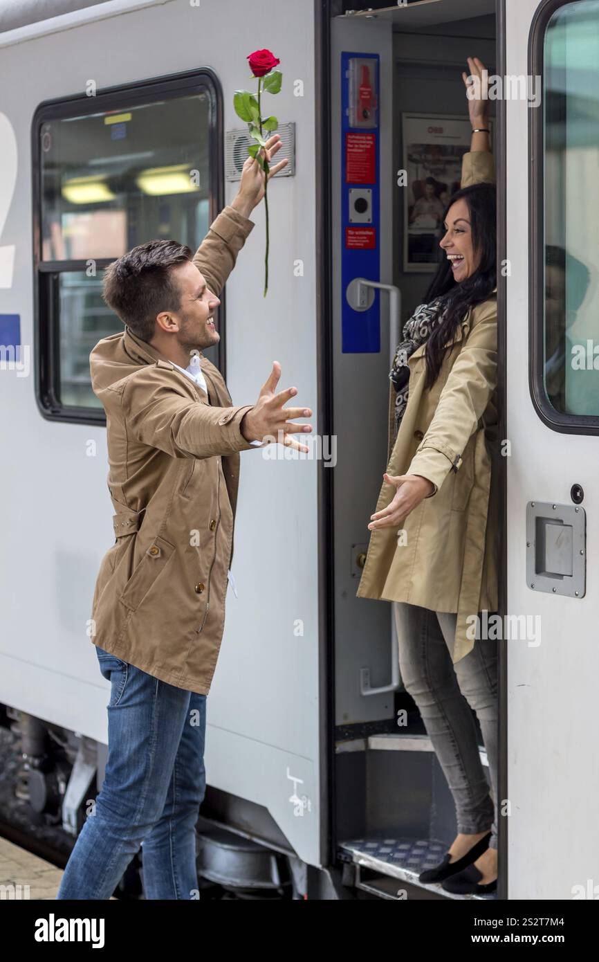 Parr arriving or saying goodbye on a platform at a railway station ...