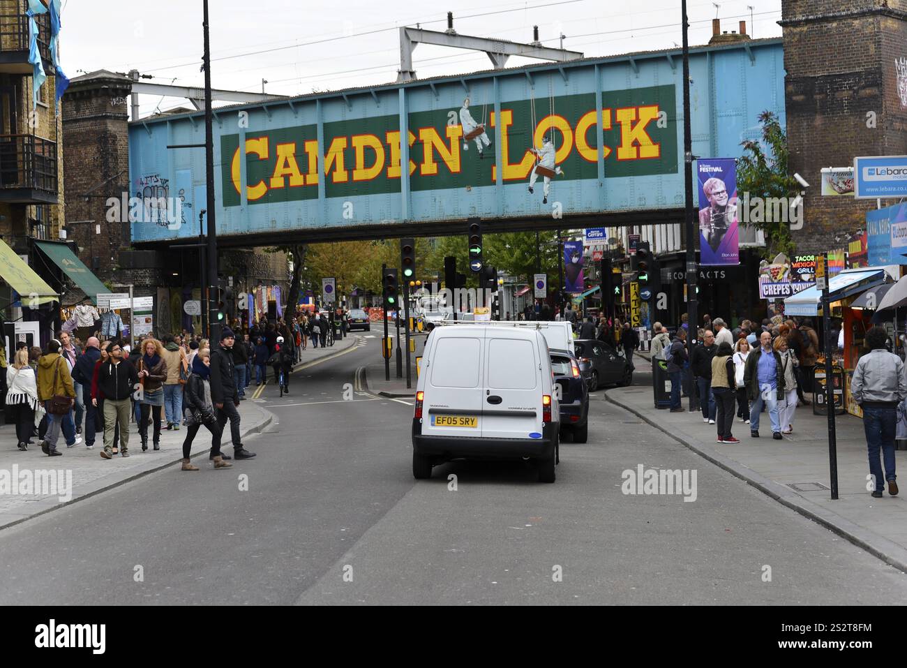 Street scene in Camden Lock with bridge and hustle and bustle, London ...