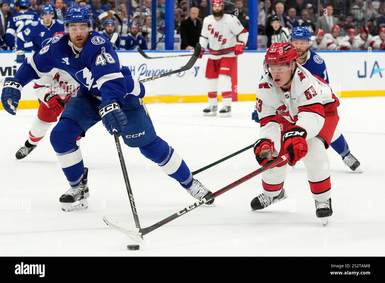 Tampa Bay Lightning defenseman Nick Perbix (48) knocks the puck away ...