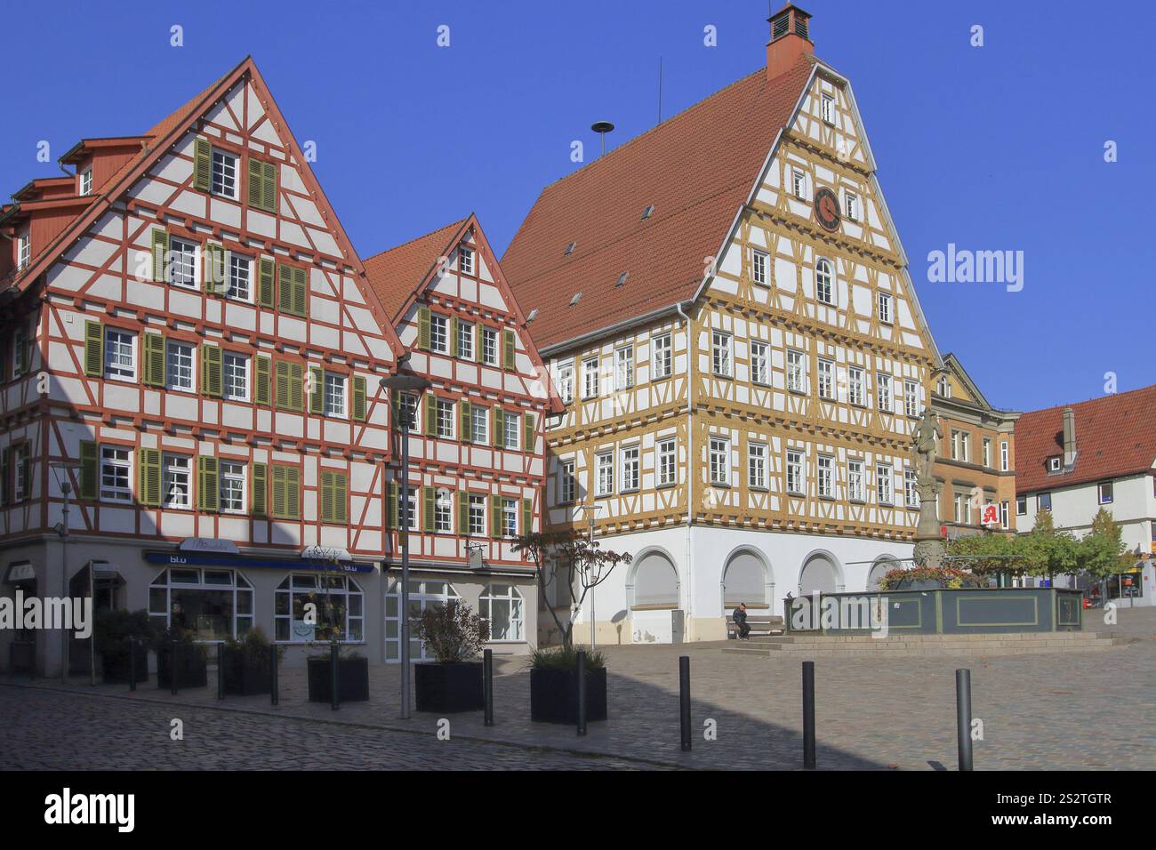 Old town hall and half-timbered houses on the market square with market ...