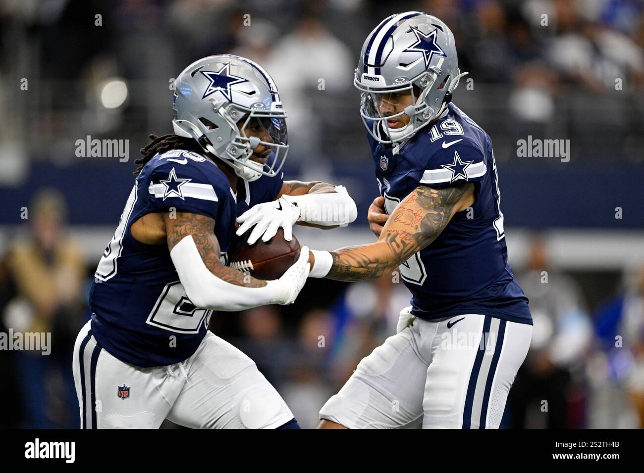 Dallas Cowboys running back Rico Dowdle (23) takes the ball from ...