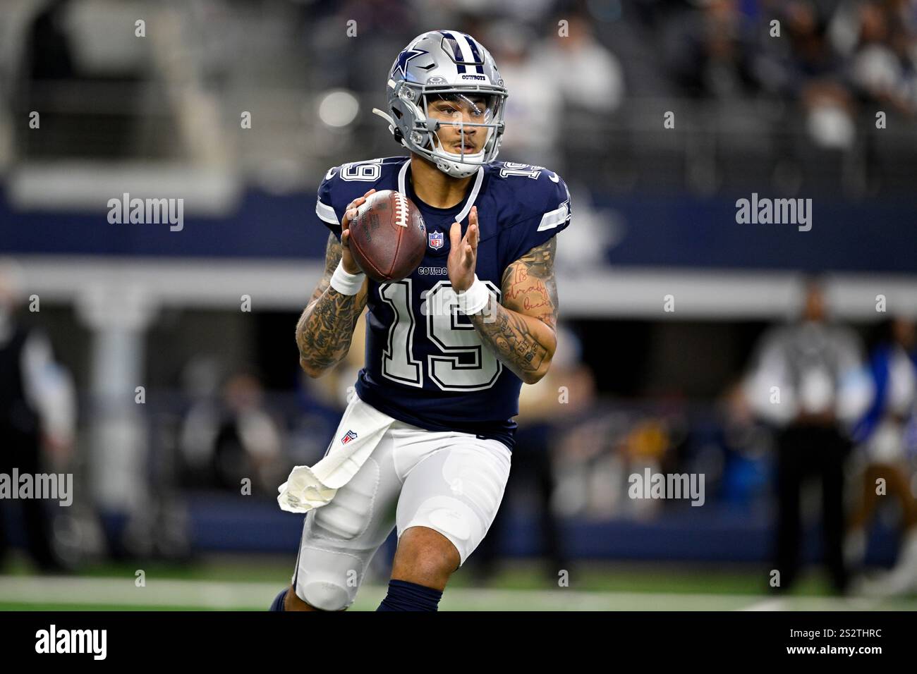 Dallas Cowboys quarterback Trey Lance (19) looks to through the ball ...