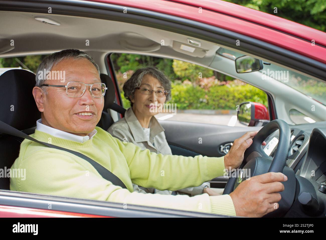 Elderly couple going for a drive Stock Photo - Alamy