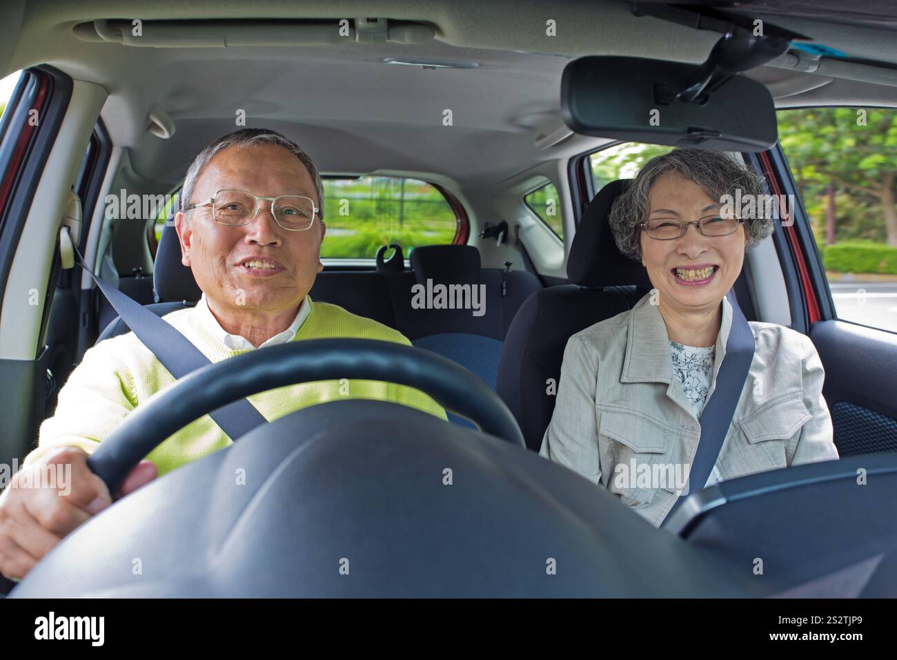 Elderly couple going for a drive Stock Photo - Alamy