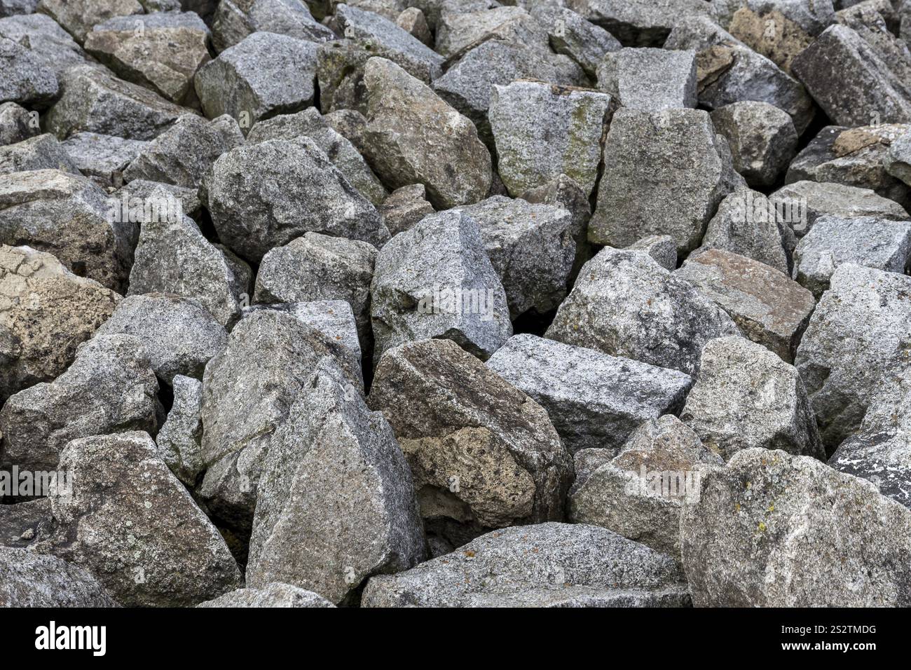A stack of natural stones lying next to each other. Symbol photo ...