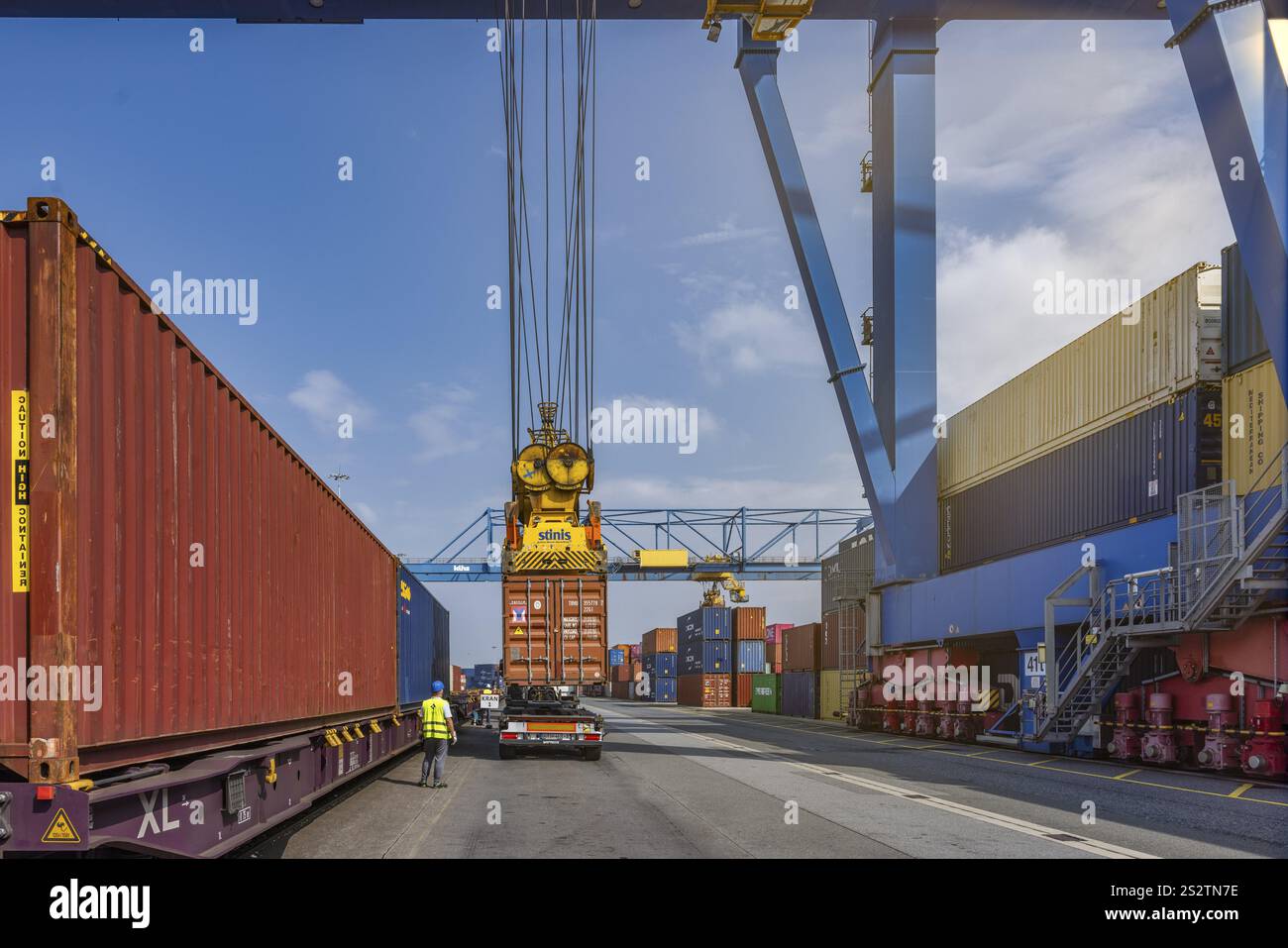 Crane loads containers onto trains and lorries at the D3T container ...