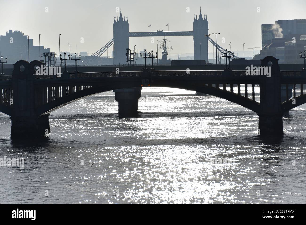View from the Millenium Bridge, Thames, Southwark Bridge in front, Tower Bridge in the ...