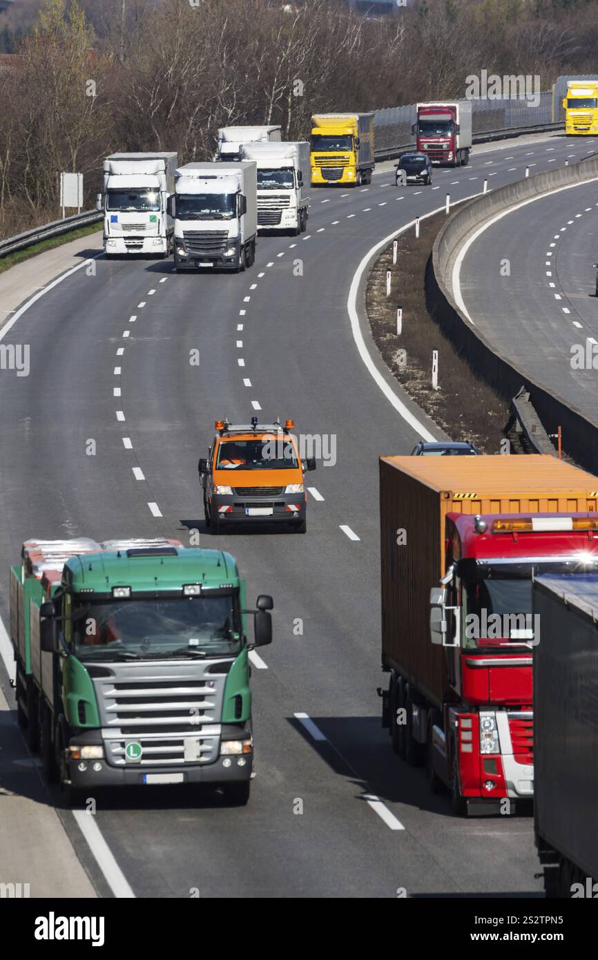 Trucks on the motorway. Road transport for goods. Austria Stock Photo ...